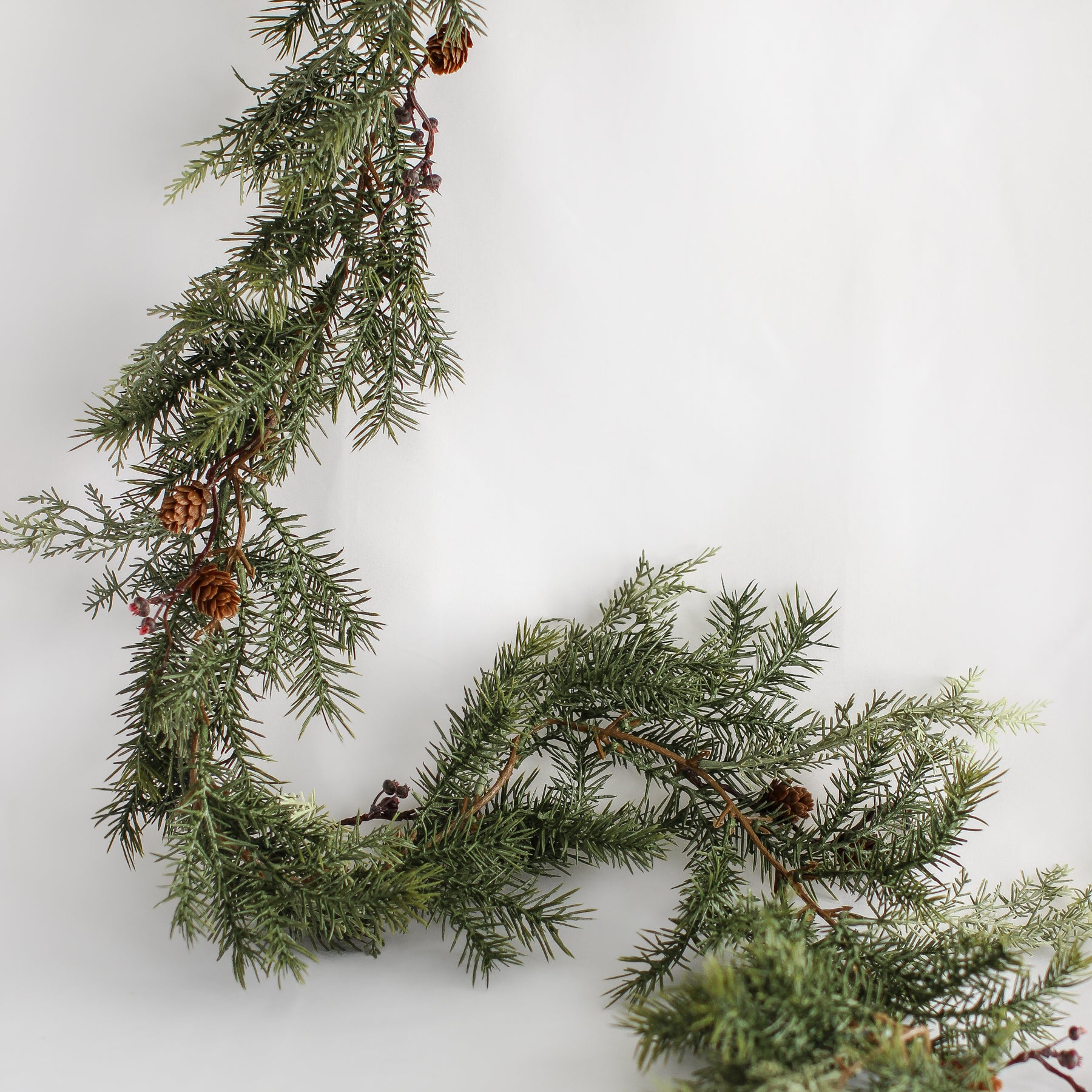Pine and Cypress Garland with Berries and Pinecones – Grow + Gather